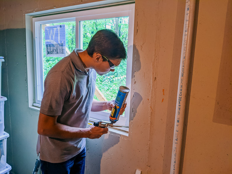 REPLACING OUR BASEMENT WINDOWS | DIY INSTALL - Grove House Reno