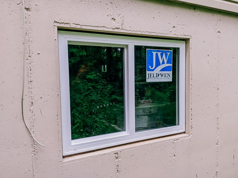 REPLACING OUR BASEMENT WINDOWS | DIY INSTALL - Grove House Reno